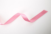 Curled pink ribbon on white stock photo containing photography and ...