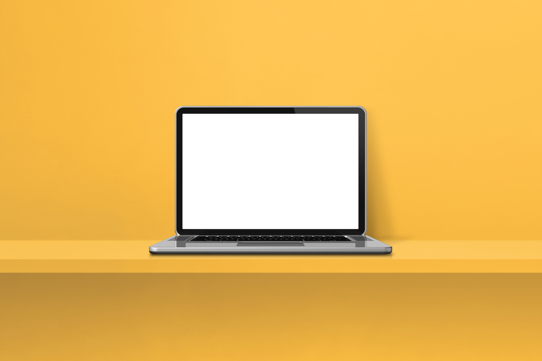 Laptop computer on yellow shelf background, a Technology Photo by GoodGoods
