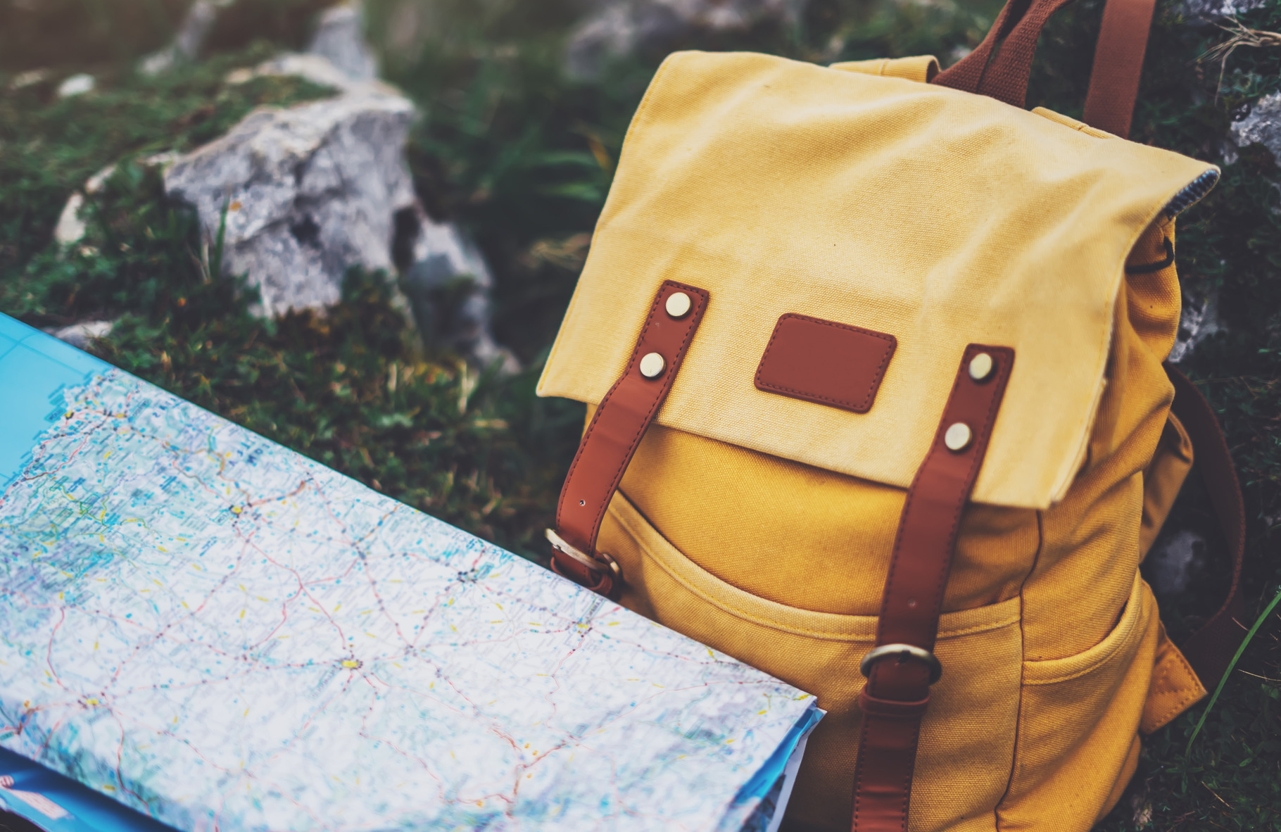 Traveler's map and backpack featuring backpack, map, and tourist ...