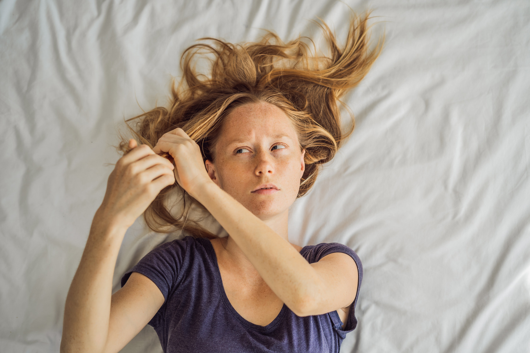 Extremly tired young woman lying on featuring second wave, sitting, and ...