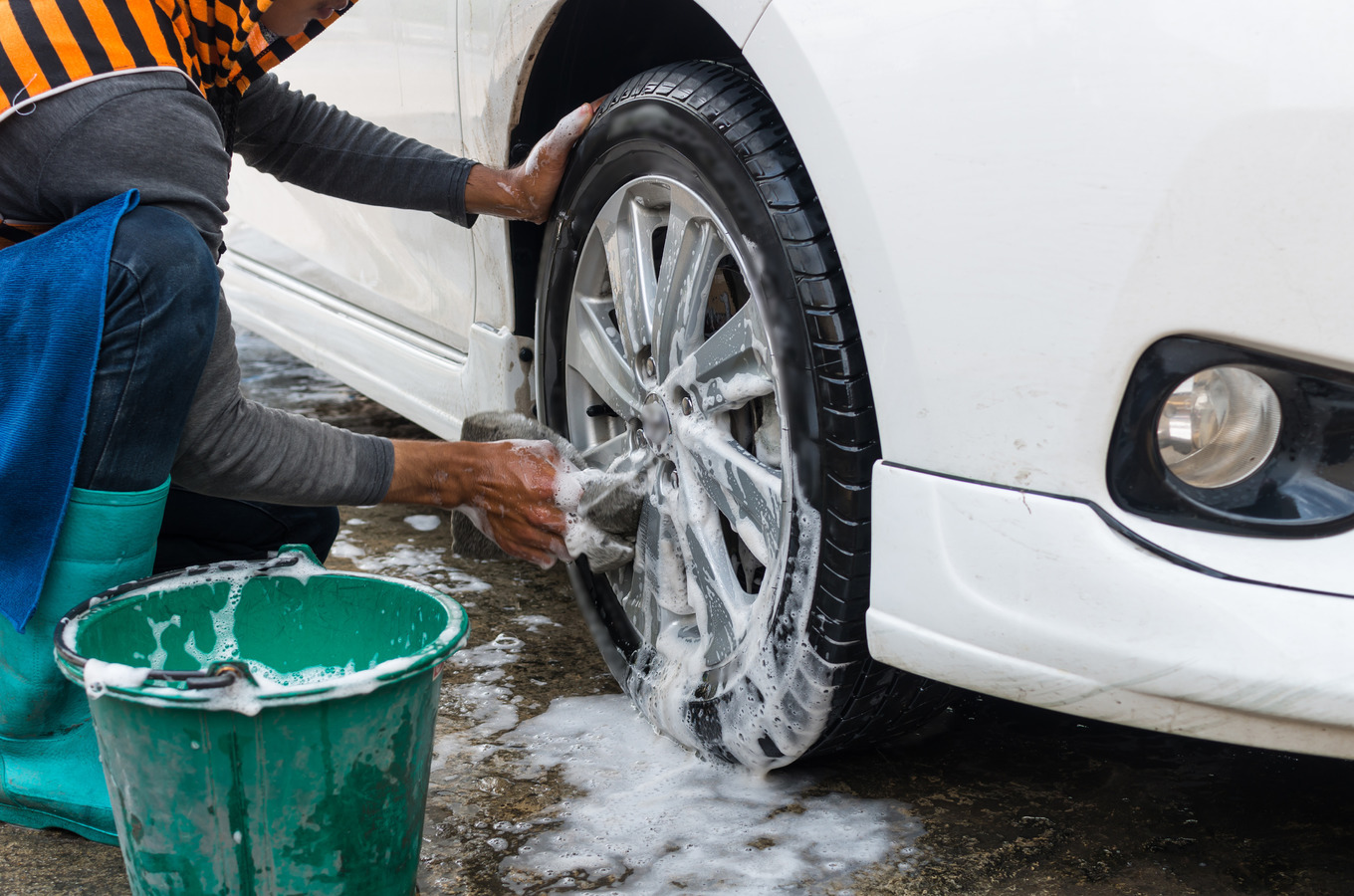 Washing car's wheels, an Industrial Photo by Tzido Gallery