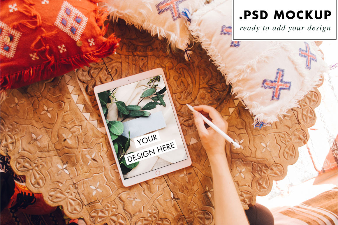 ipad in rustic wood pillow mockup, a Product Mockup by Travelling Mockups