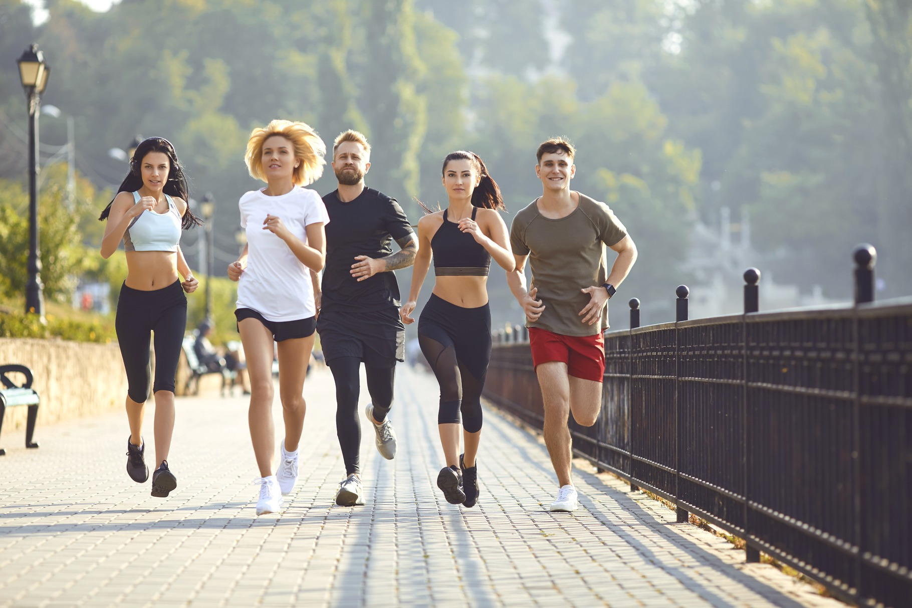 Group of runners in the park in the featuring run, running, and group ...