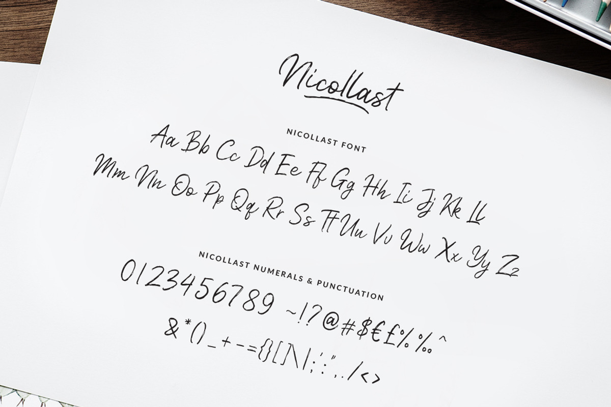 Nicollast Handwritten Brush Font, a Script Font by Weape Studio