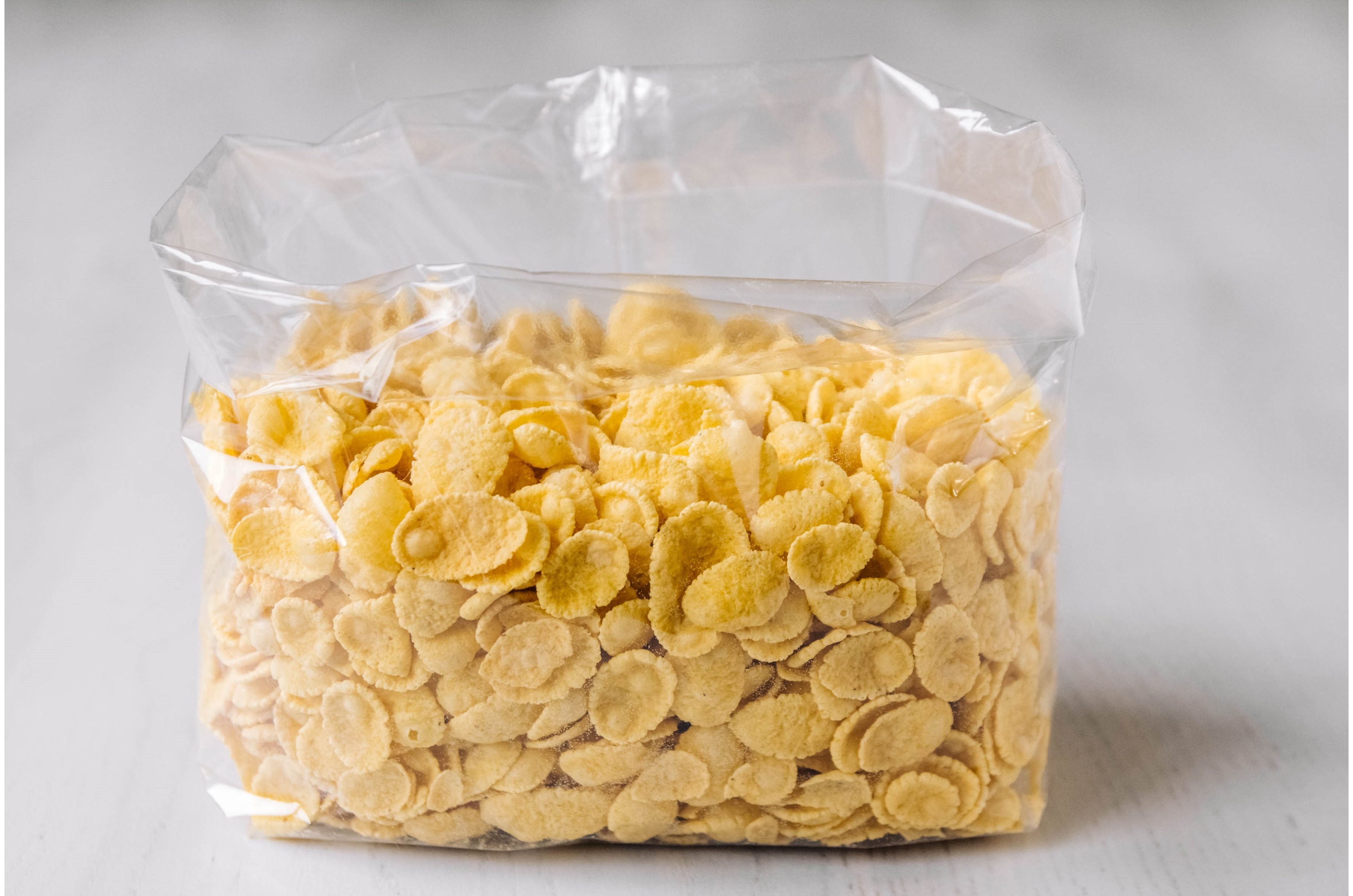 Cornflakes in plastic bag on white, a Food & Drink Photo by olhovyi ...
