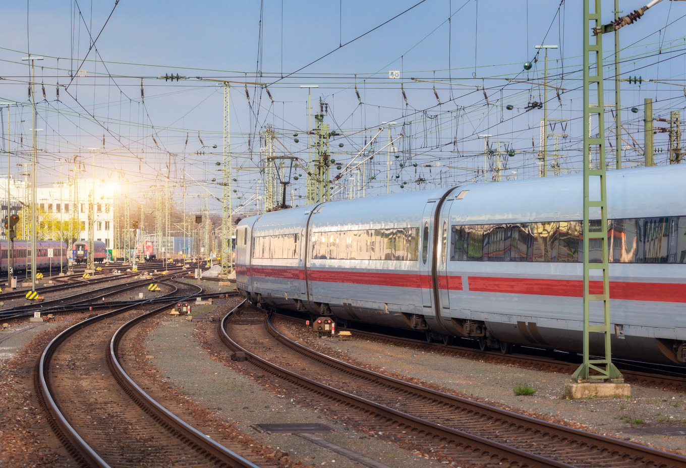 High speed white passenger train, a Photo by den-belitsky