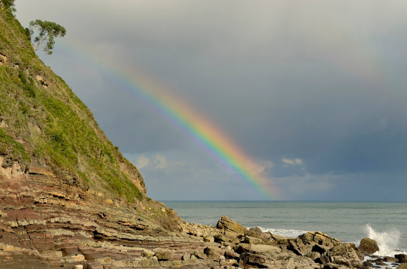 Rainbow over the sea, a Nature Photo by jcfmorata - Photography
