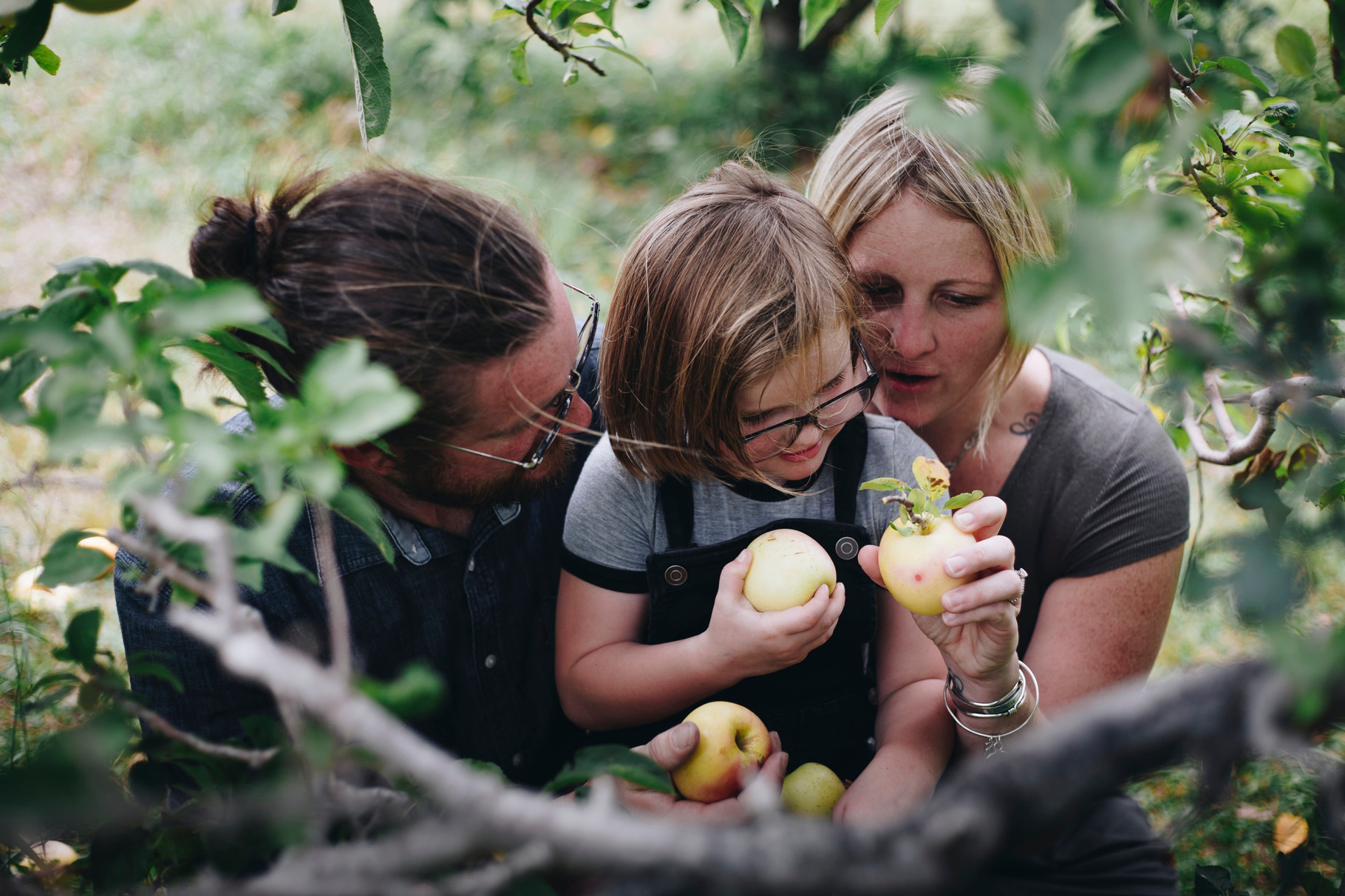 Family spending time at the farm featuring america, american, and apple ...