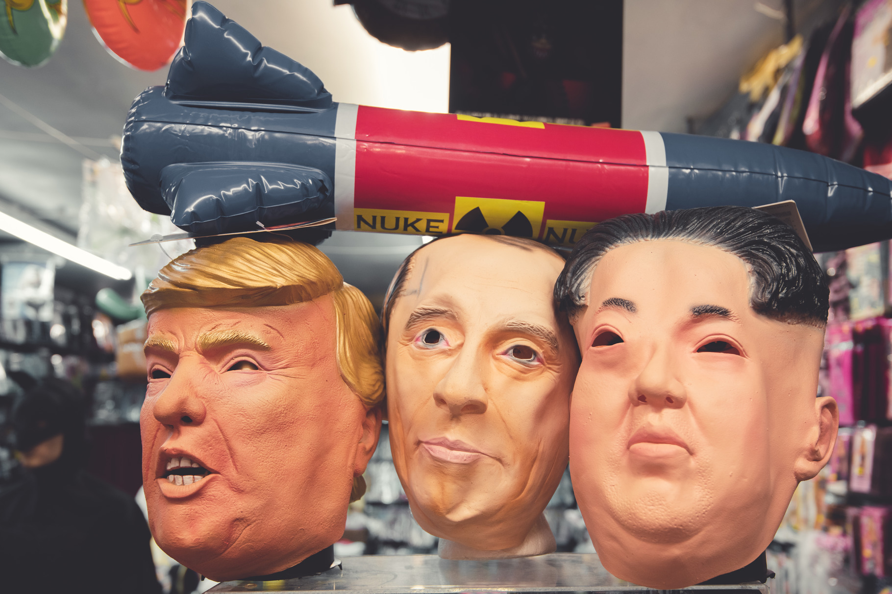 Masks of Donald Trump, kim jong un, a Person Photo by Piranhi