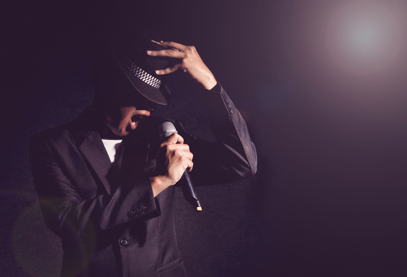 Singer hand holding the microphone featuring background, concert, and ...