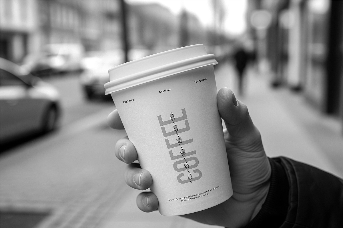 Hand Holding Paper Coffee Cup Mockup