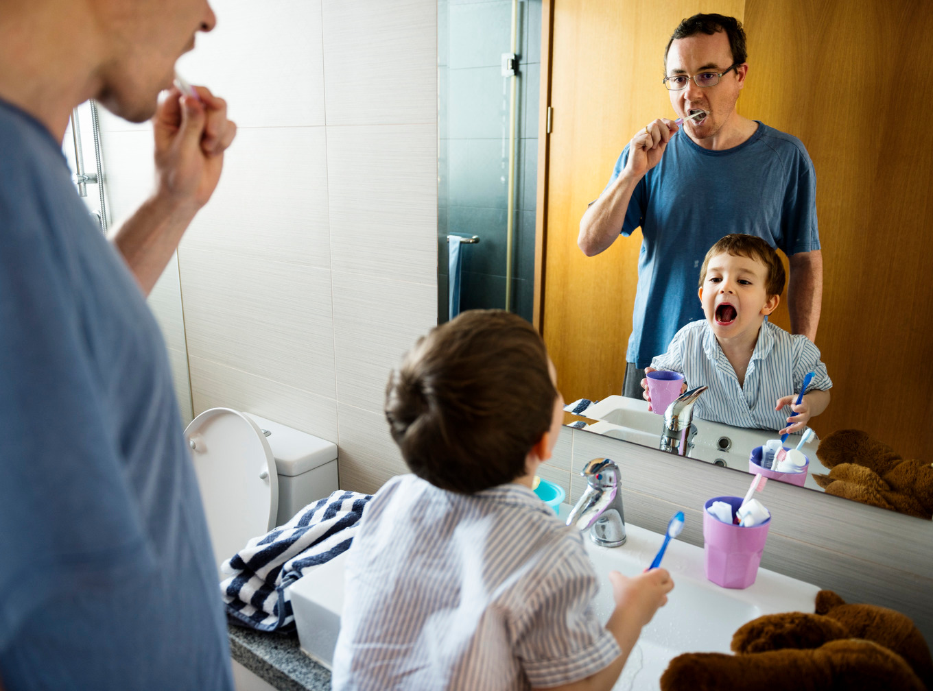 Family tooth brushing stock photo containing home and indoors, a Person ...