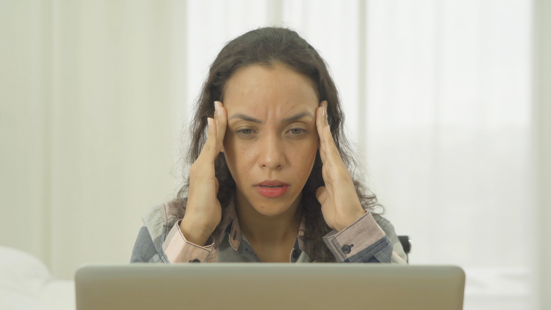 Tired latin young businesswoman have eyes pain. People sitting o ...