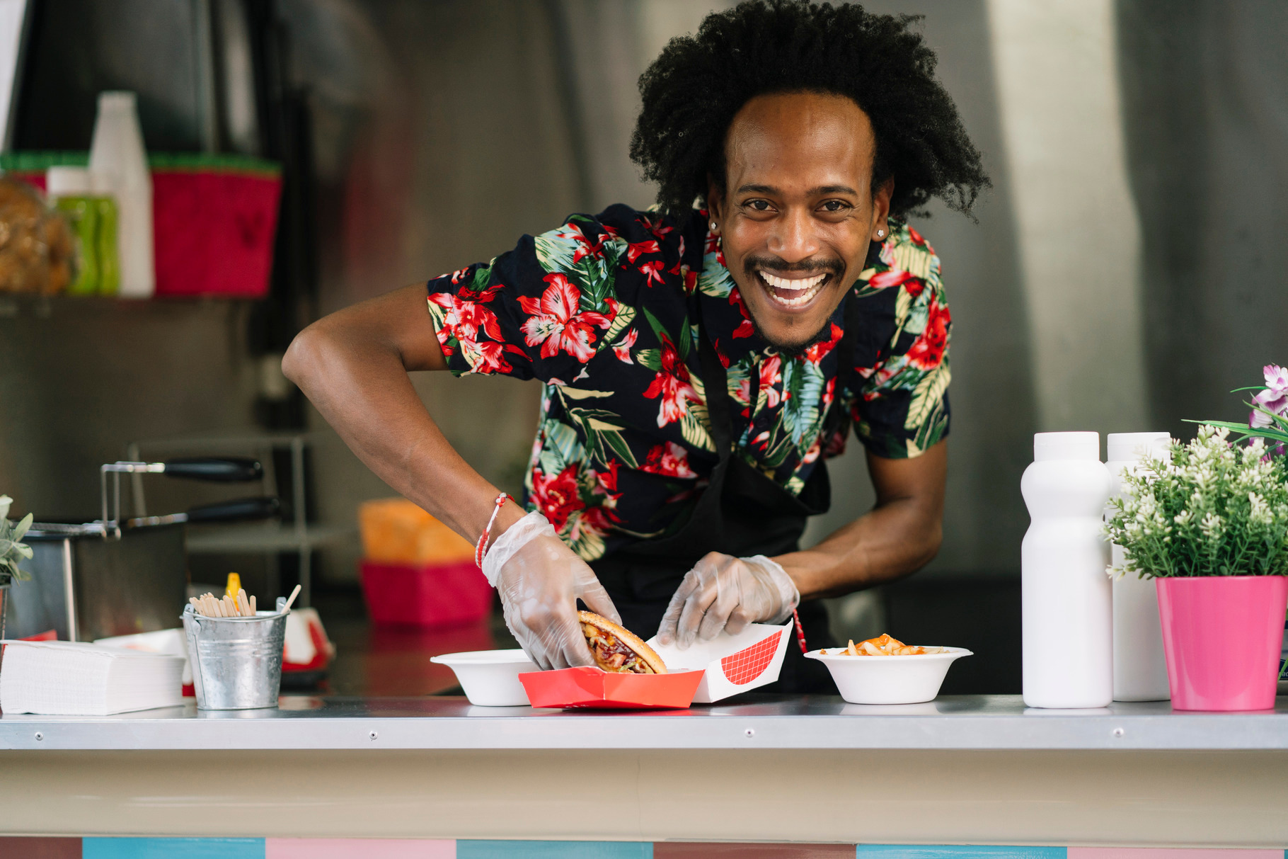 Smiling food vendor hands food to wa featuring lunch, takeout, and ...