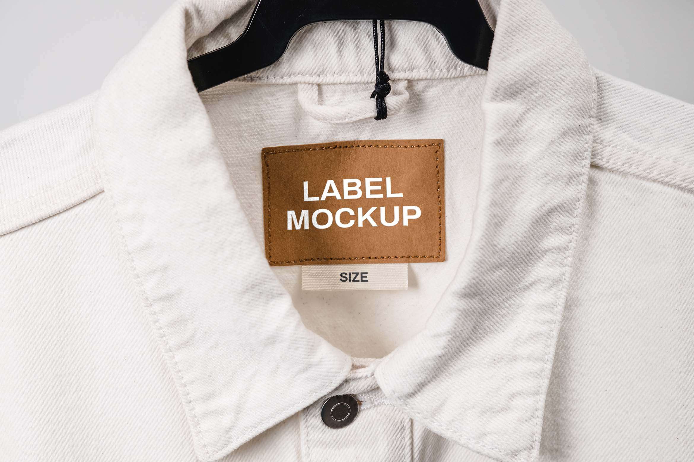 Mockup clothing label denim jacket, a Hoody Mockup by Daniel Megias