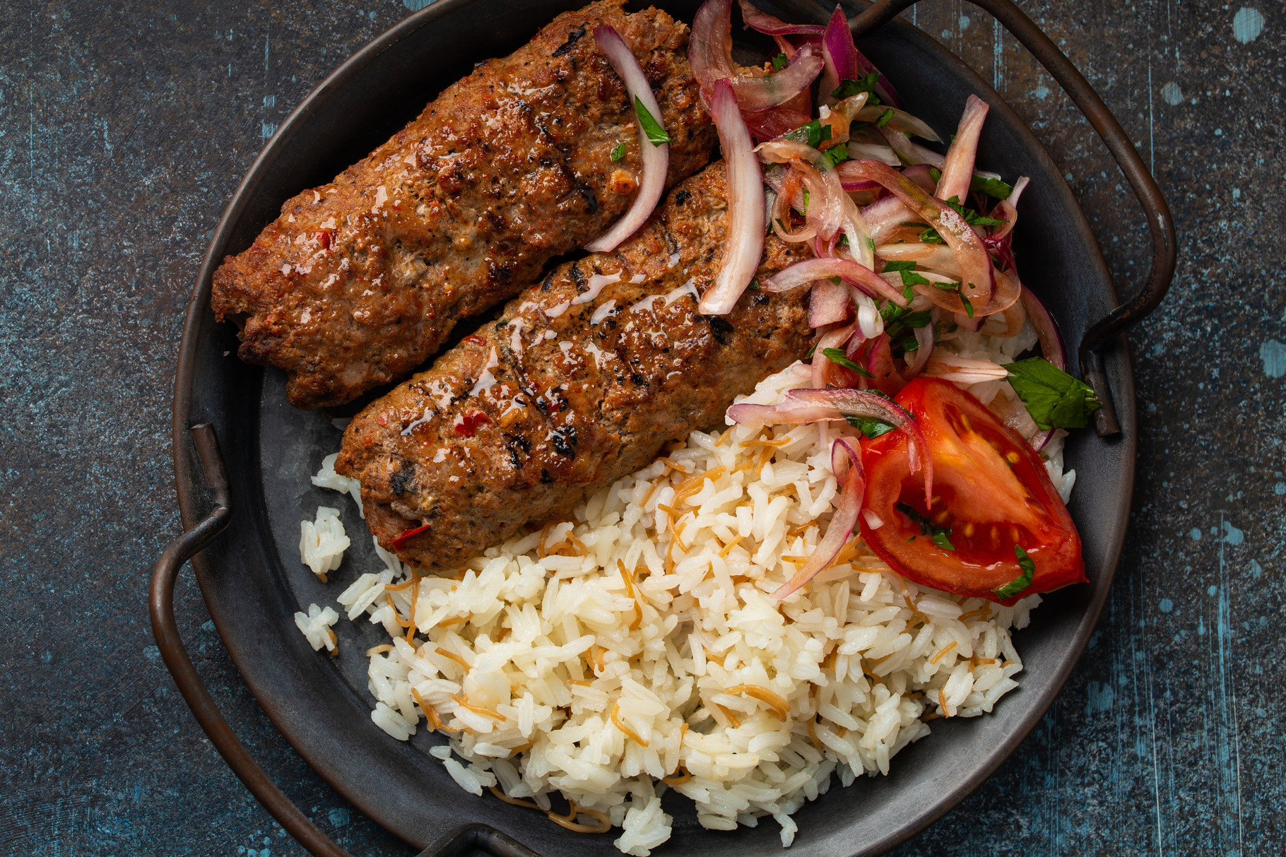 Traditional Turkish dish meat kebab with rice and vegetables in, a Food ...