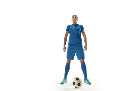 Professional football soccer player with ball isolated white background ...