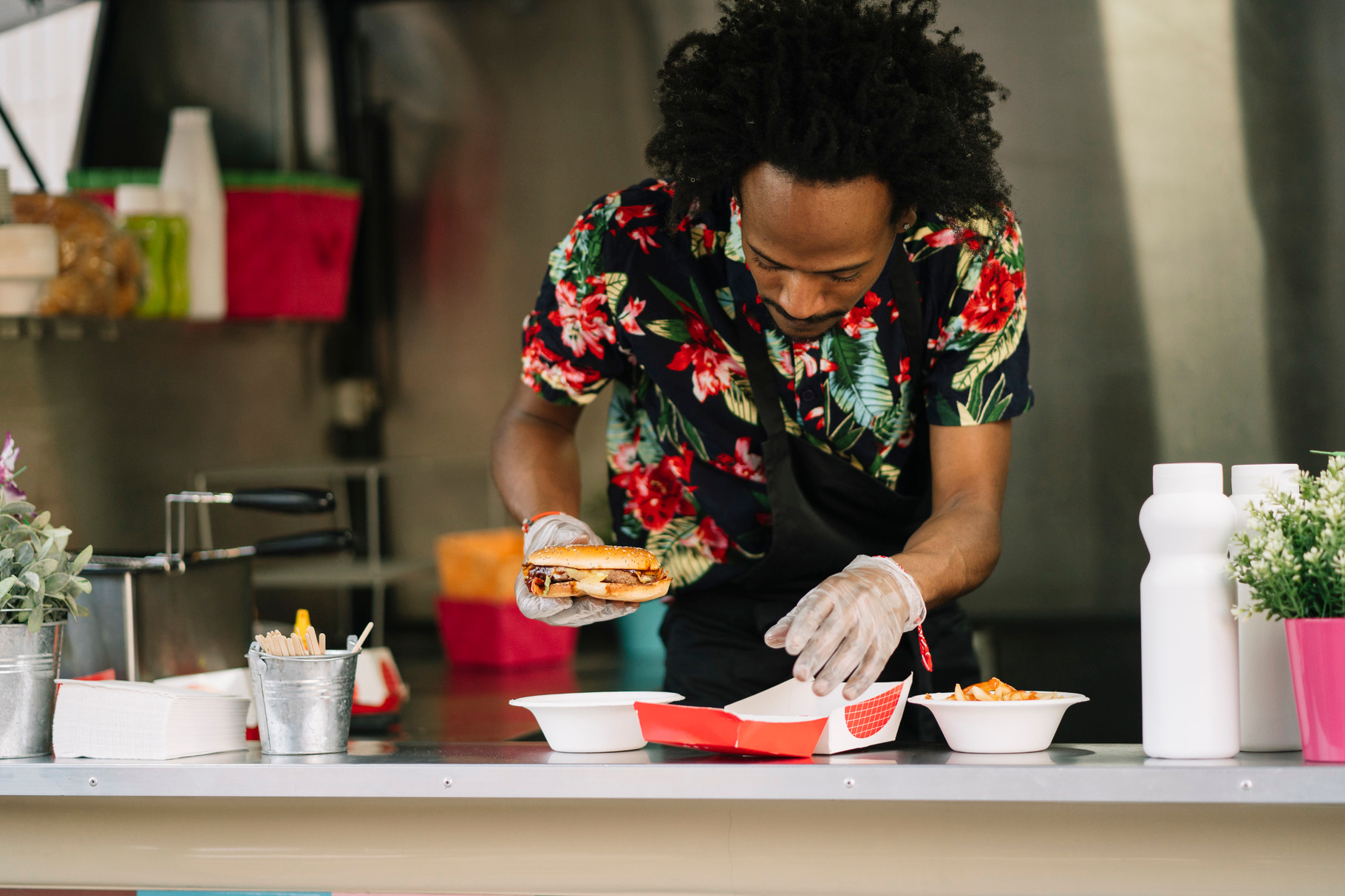 Smiling food vendor hands food to wa featuring lunch, takeout, and ...