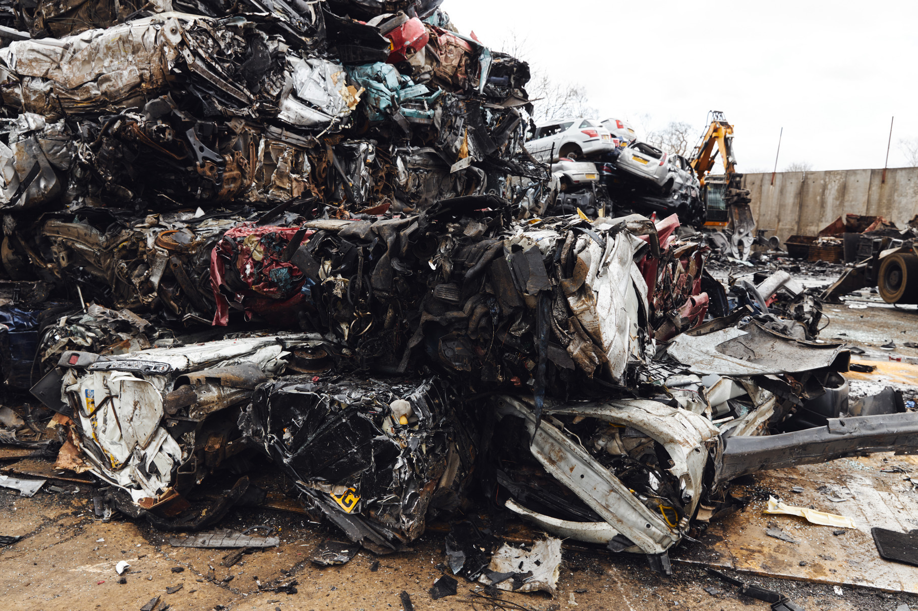 Scrapped Cars Crushed In Vehicle Recycling Centre, a Photo by Southworks