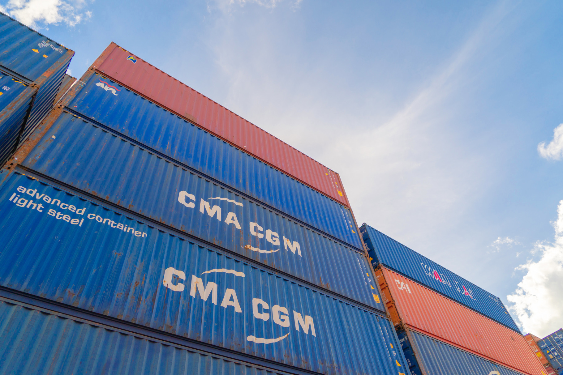 Shipping container site loading by crane in logistic port wareho, an ...