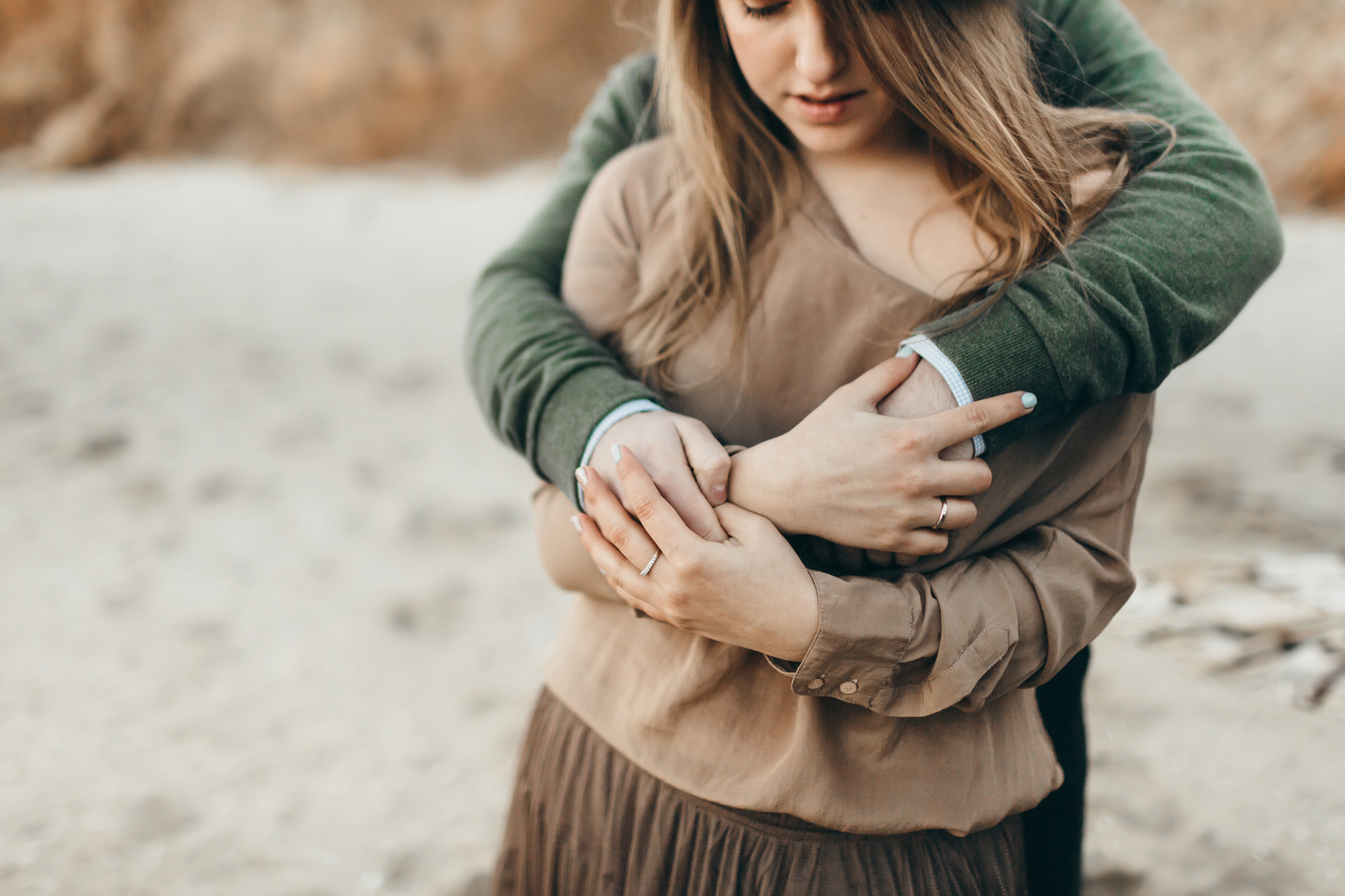 Hugs from back. Outdoors. Country style wedding. Close-up portrait, a ...
