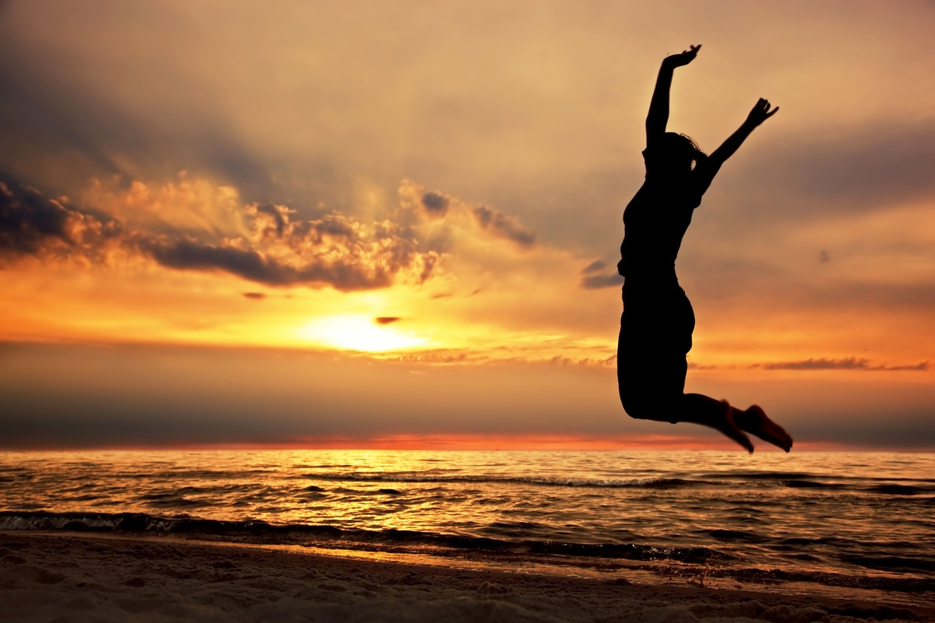 Happy woman jumping on the beach, a Person Photo by Photocreo Michal ...