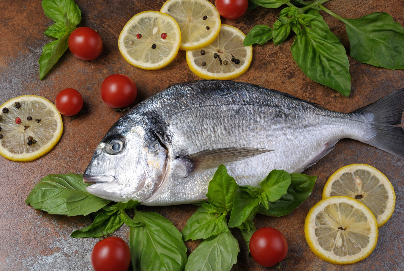 Raw fish dorado featuring fish dorado seafood lemon tomato cherry raw ...