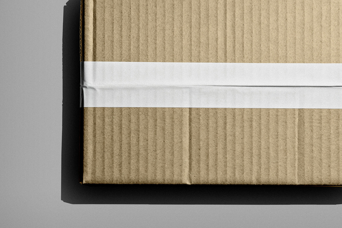 Parcel Box Mockup, a Packaging Mockup by Design Squad