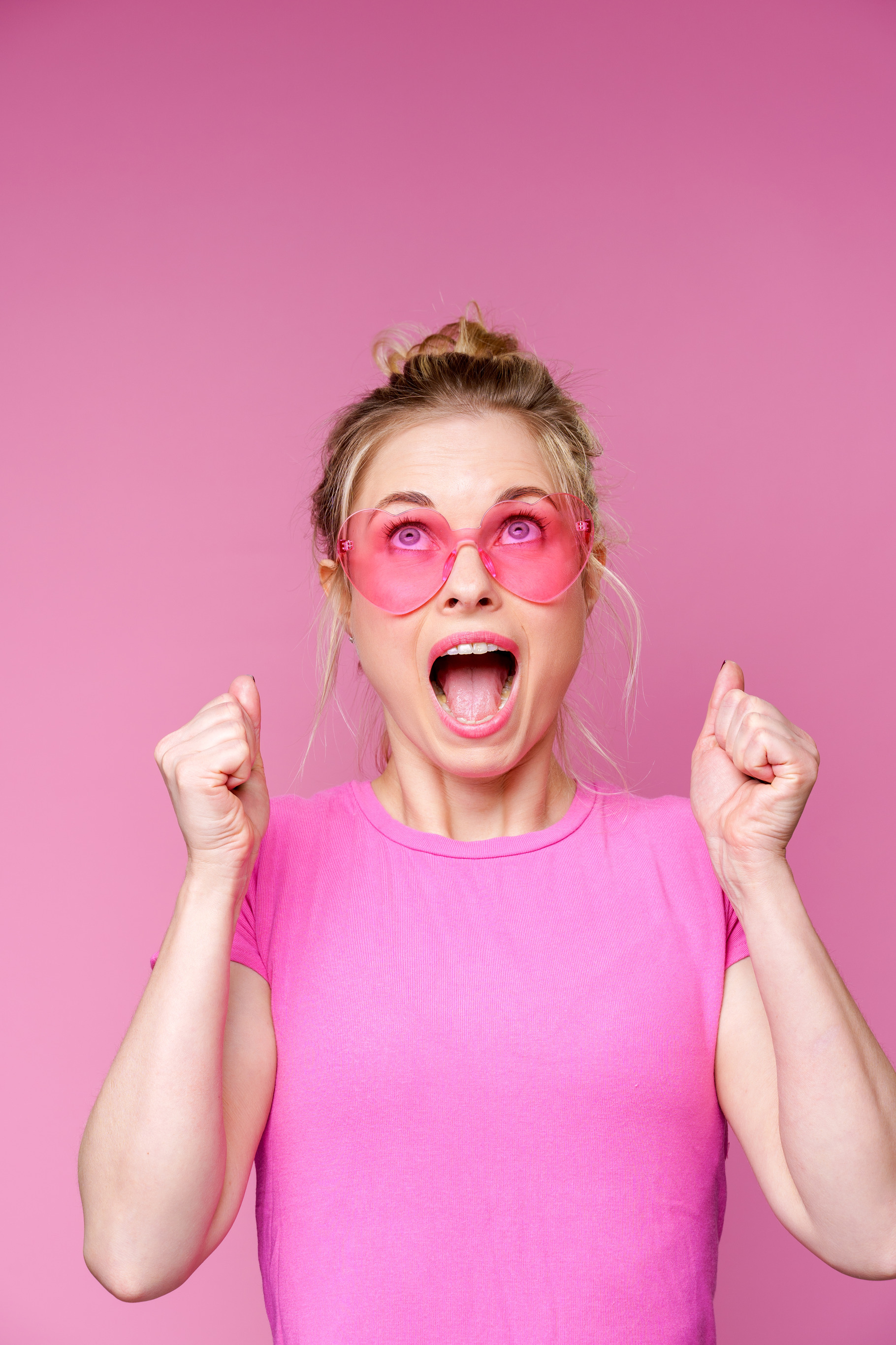 Portrait of cheerful blonde in pink | People Images ~ Creative Market