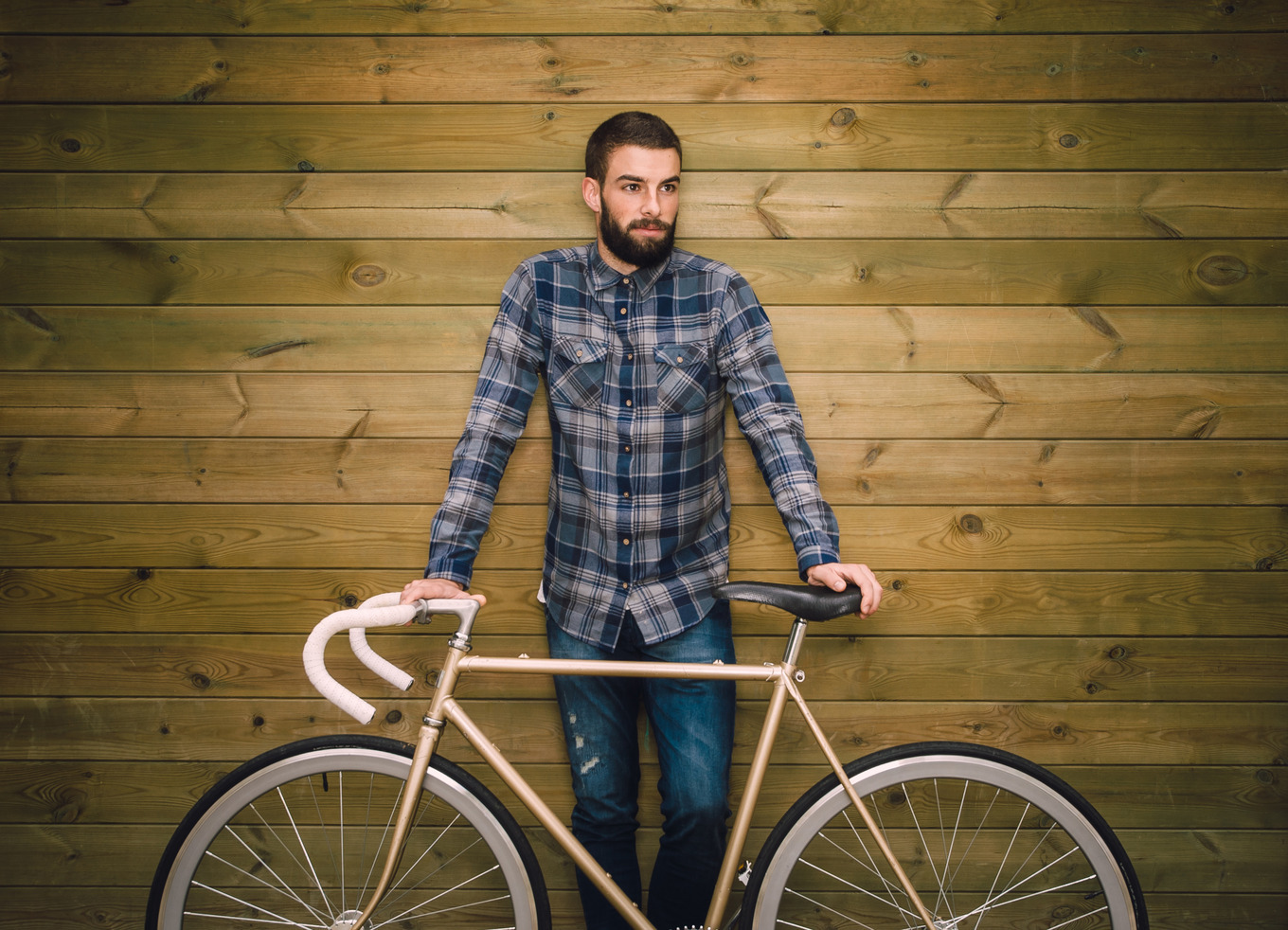 Hipster man with his fixie bike containing hipster, fixie, and man, a ...