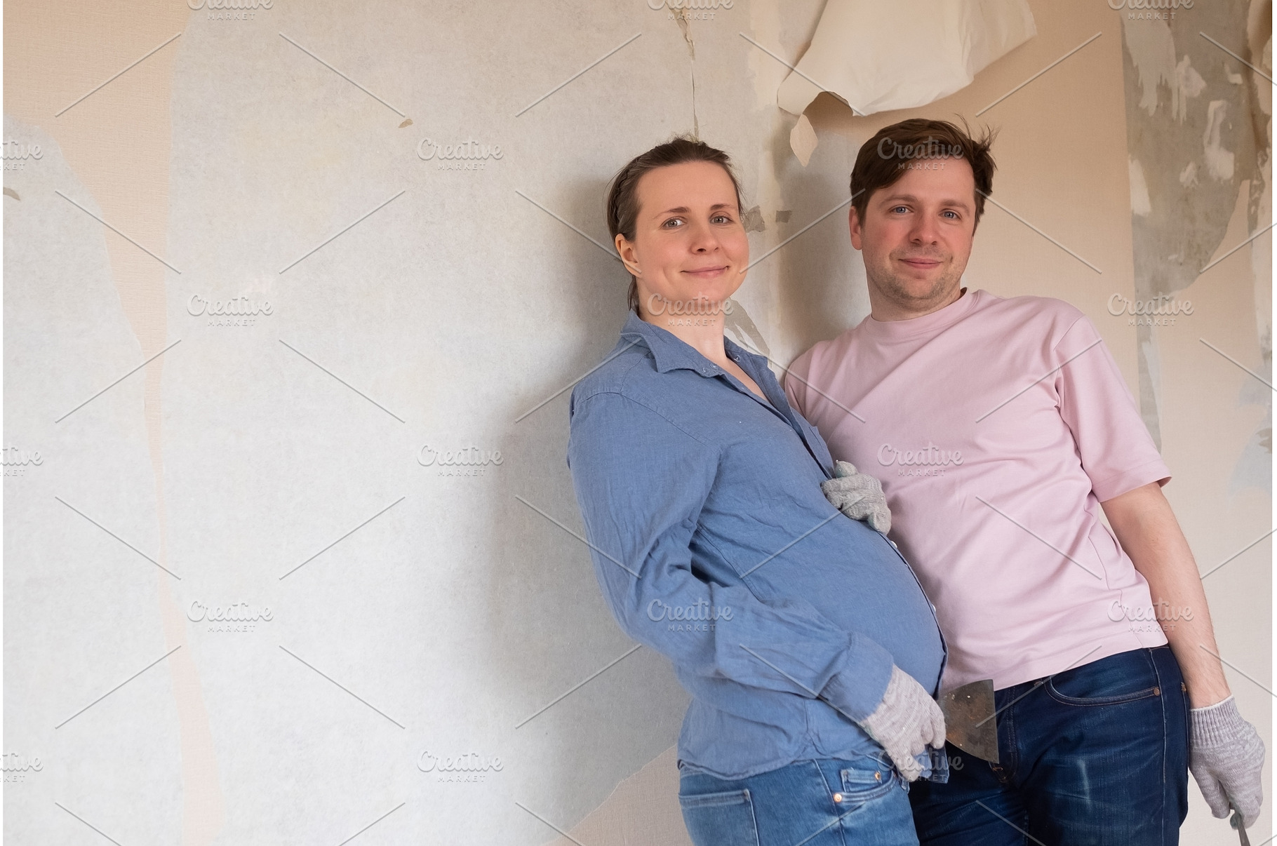 Young couple removing old wallpaper, a Person Photo by Koldunova ...