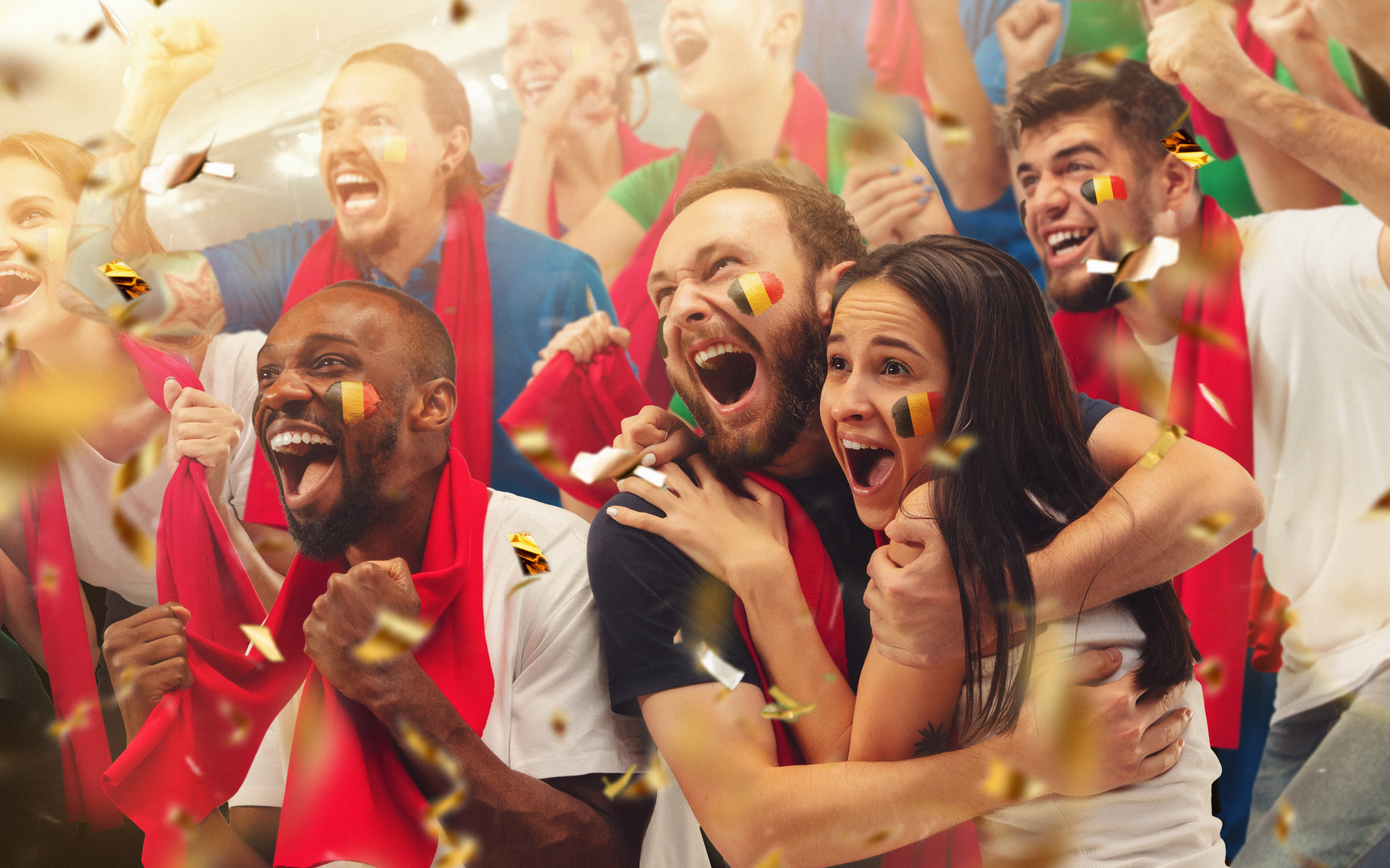 Group of happy fans are cheering for, a Person Photo by Volodymyr Melnyk