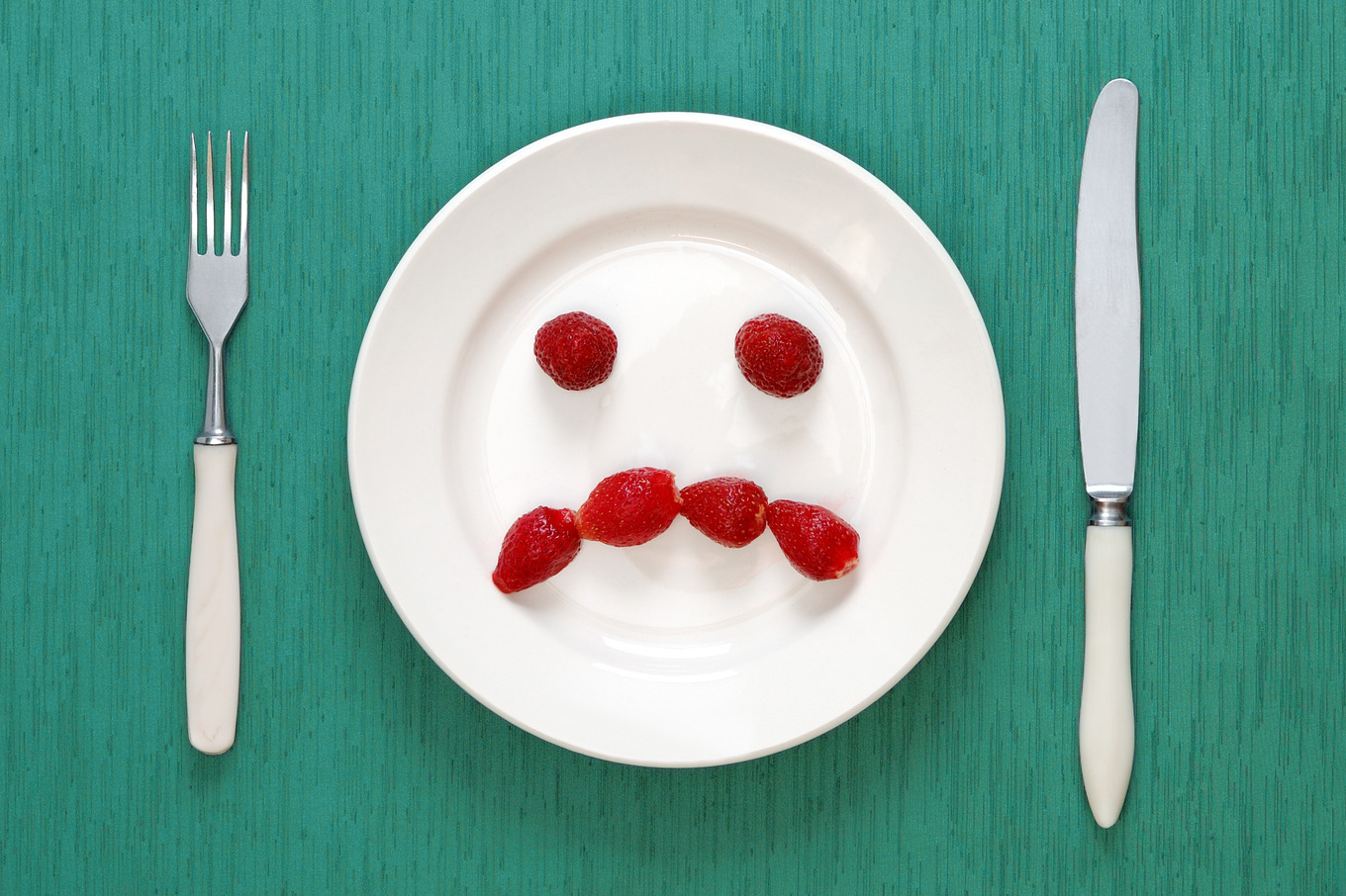 Fork, knife and sad face, a Food & Drink Photo by Anatoliy Sadovskiy
