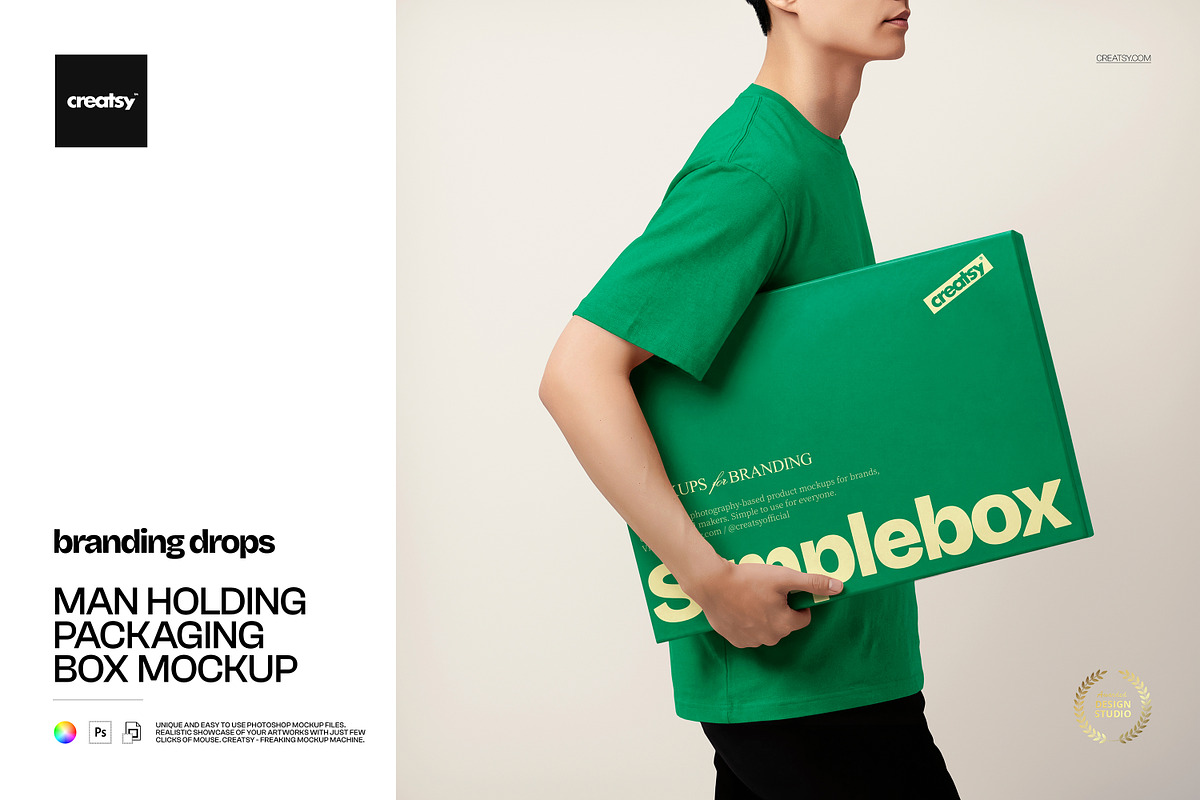Man Holding Packaging Box Mockup, a Packaging Mockup by creatsy5