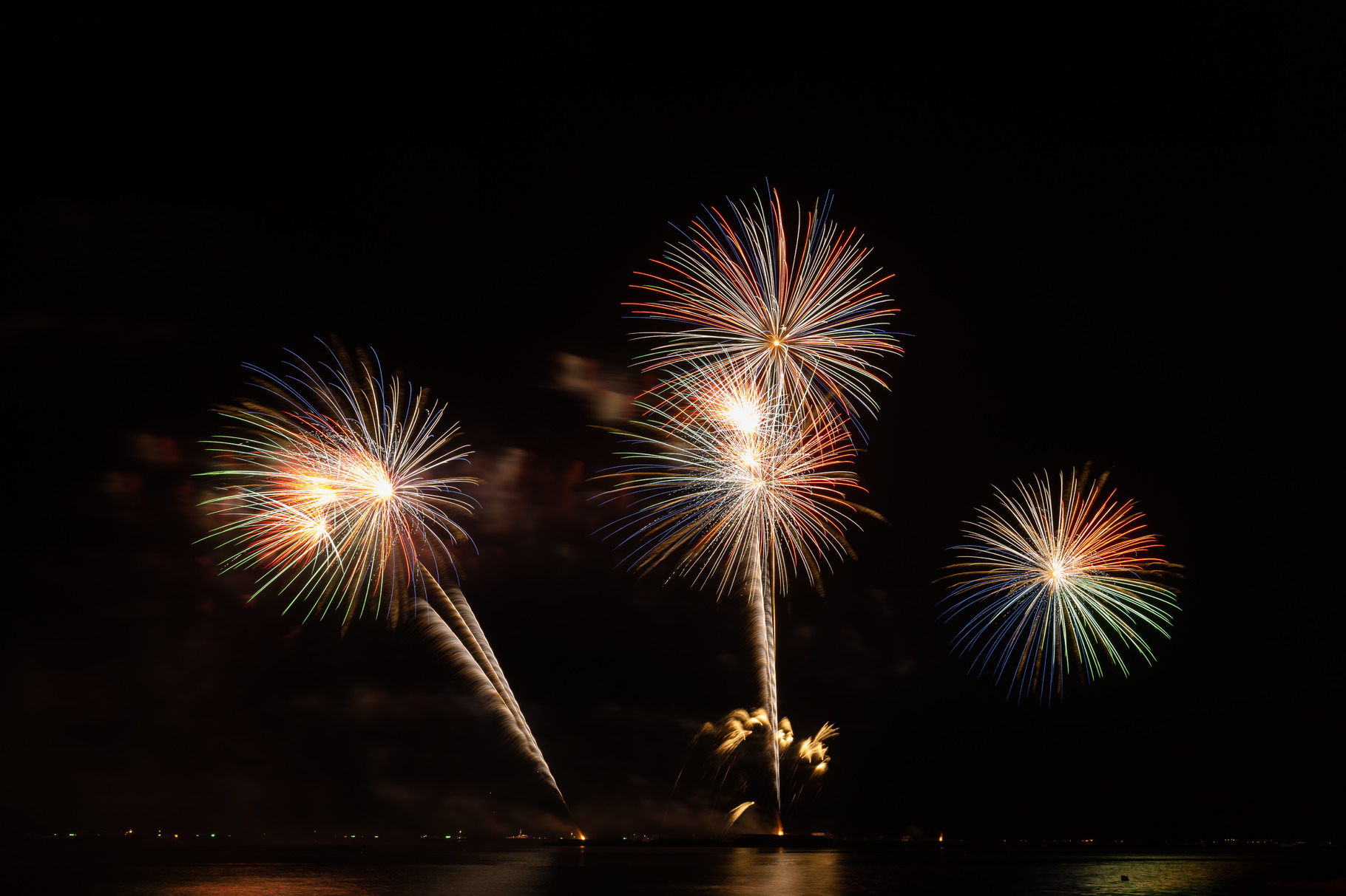 Firework in dark sky background, a Background Photo by Smith Chetanachan