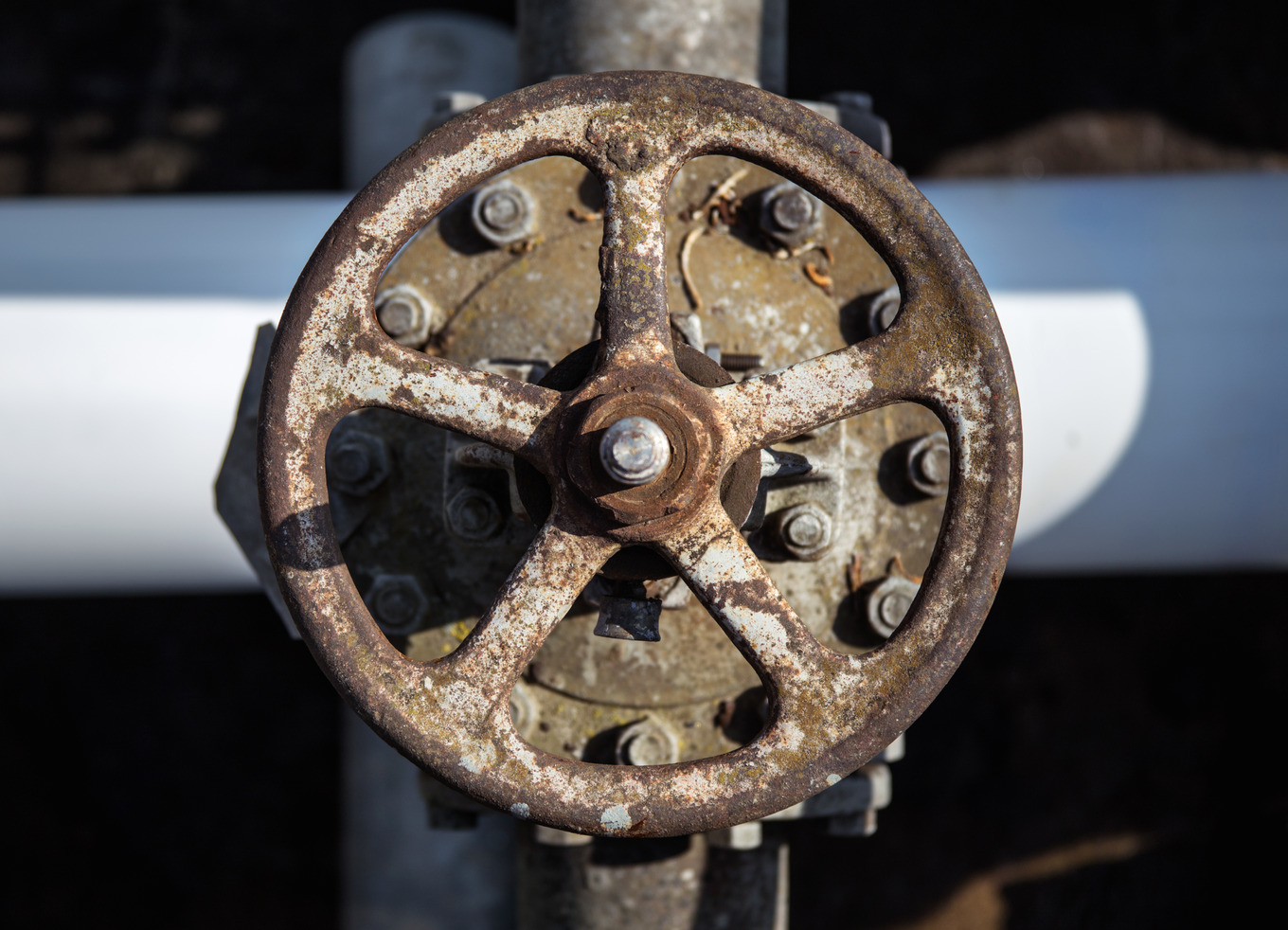 Top view on old handwheel of valve featuring handwheel, valve, and hand ...
