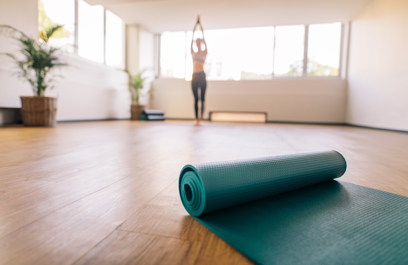 Exercise mat on floor with woman, a Sports & Recreation Photo by Jacob ...