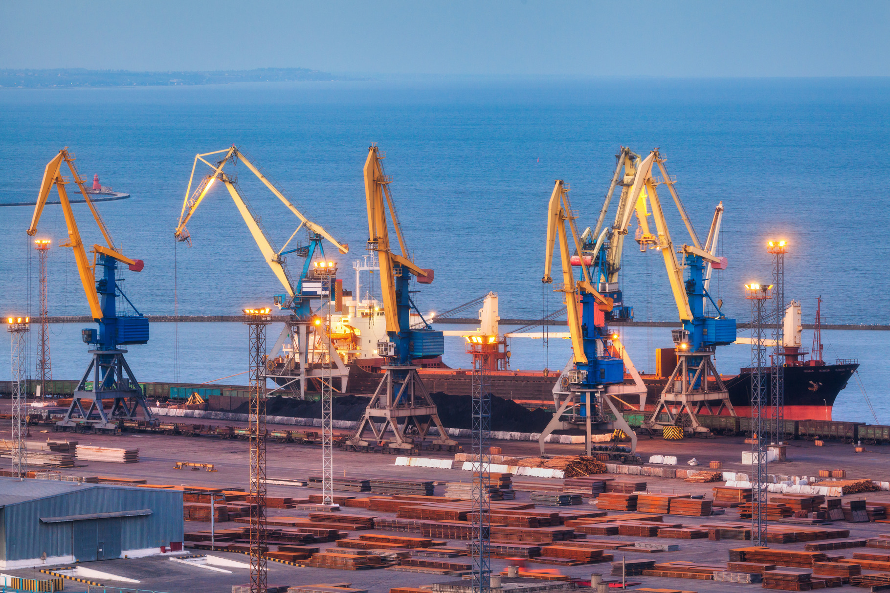 Sea commercial port at night in Mariupol, Ukraine before the war, an ...