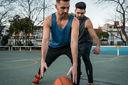 Young basketball players playing one-on-one., a Person Photo by Mego-studio