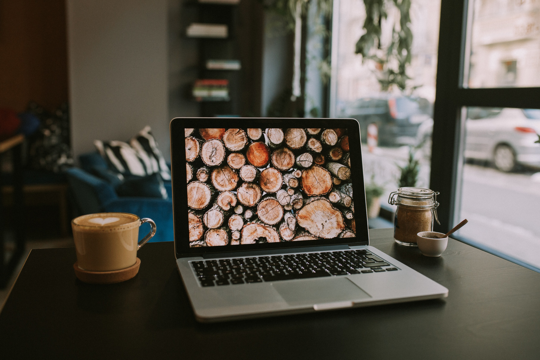 Macbook pro in the cafe 1 featuring macbook, apple, and screen, a ...