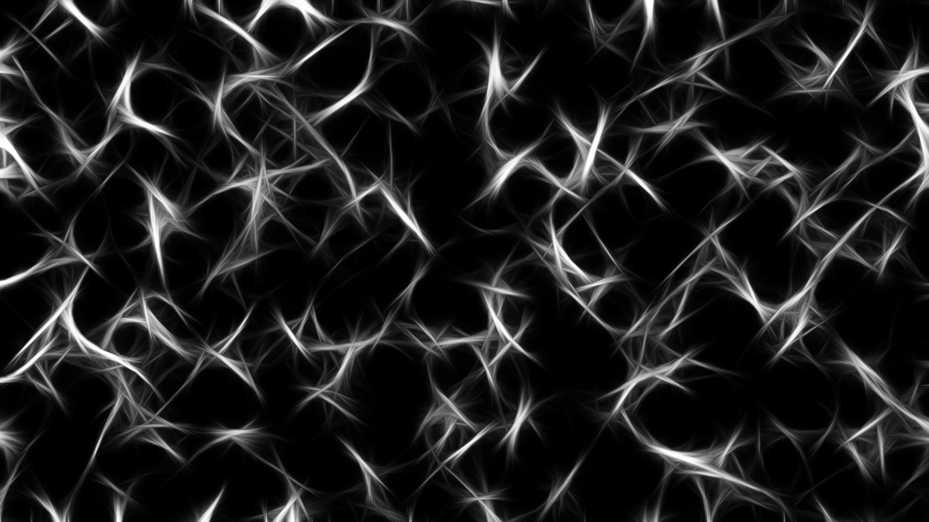 White fur blowing in the air. White feather on isolated black ba, an ...