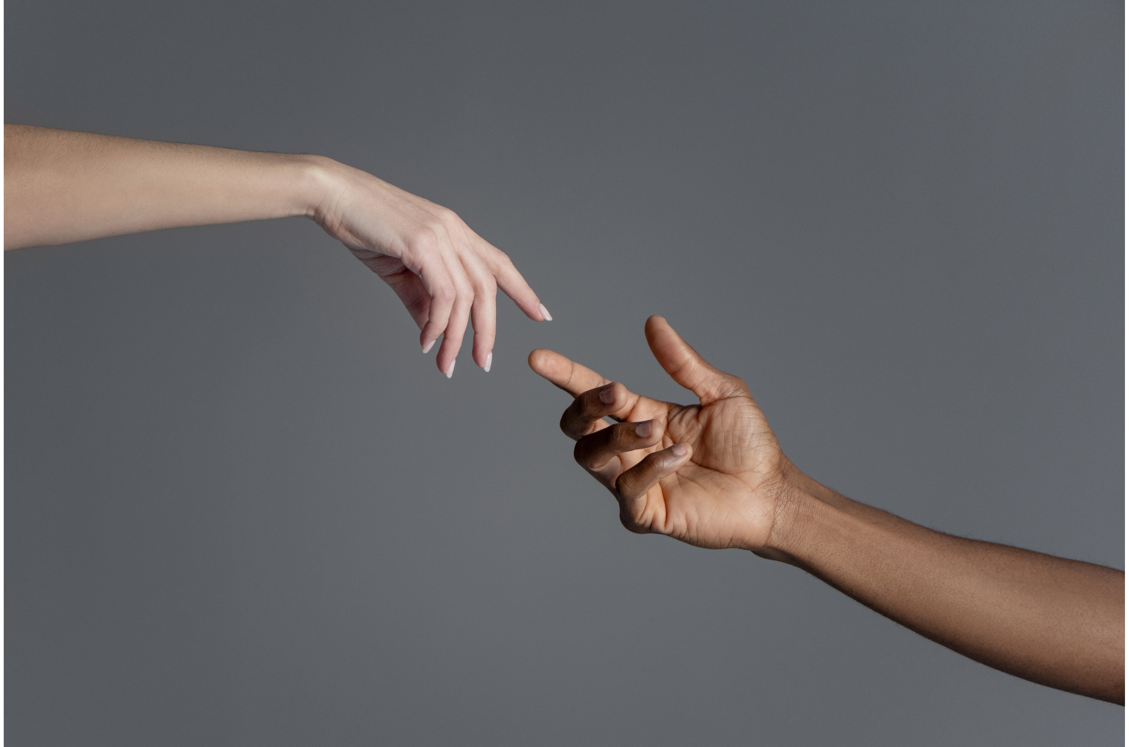 Male and female hands reaching out, a Person Photo by Aliona Serzhanova