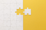 top view of white jigsaw puzzle on y, an Abstract Photo by LightField ...