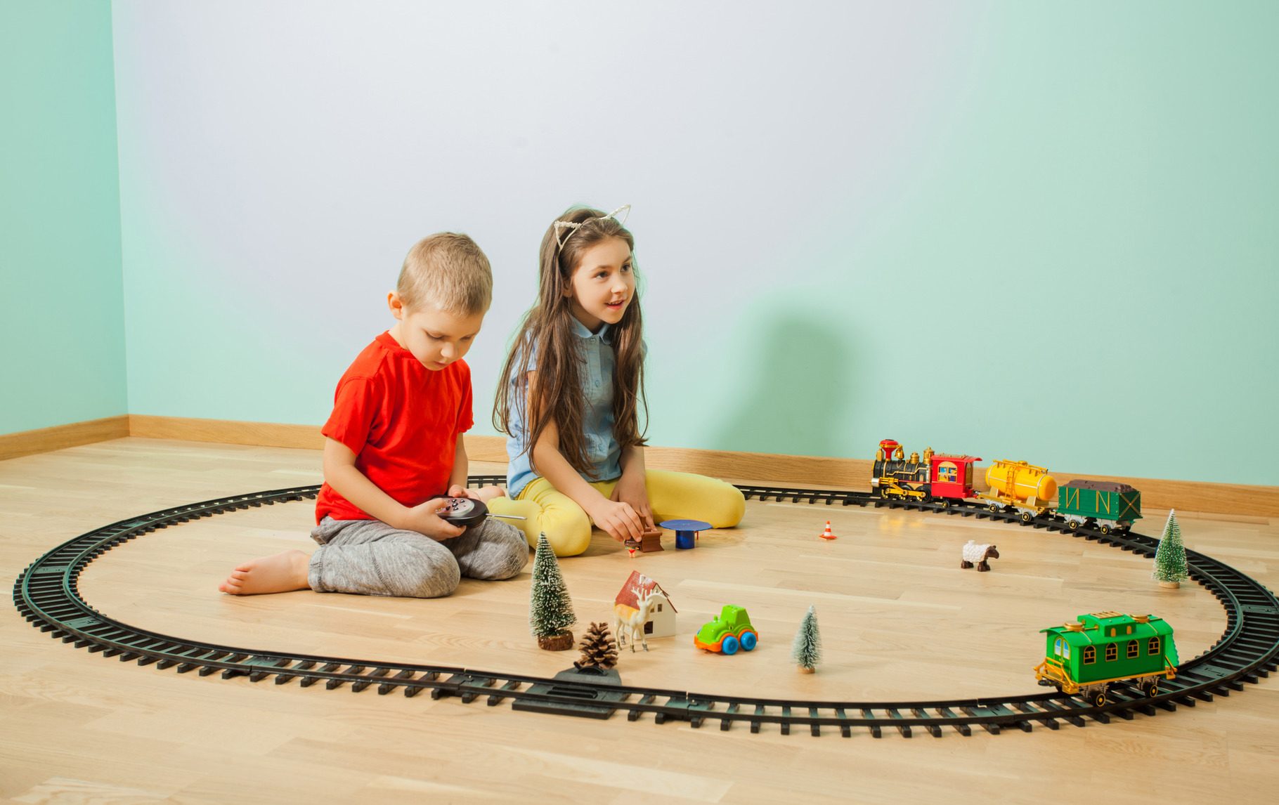 Two happy cute kids playing railway, an Architecture Photo by oksix ...