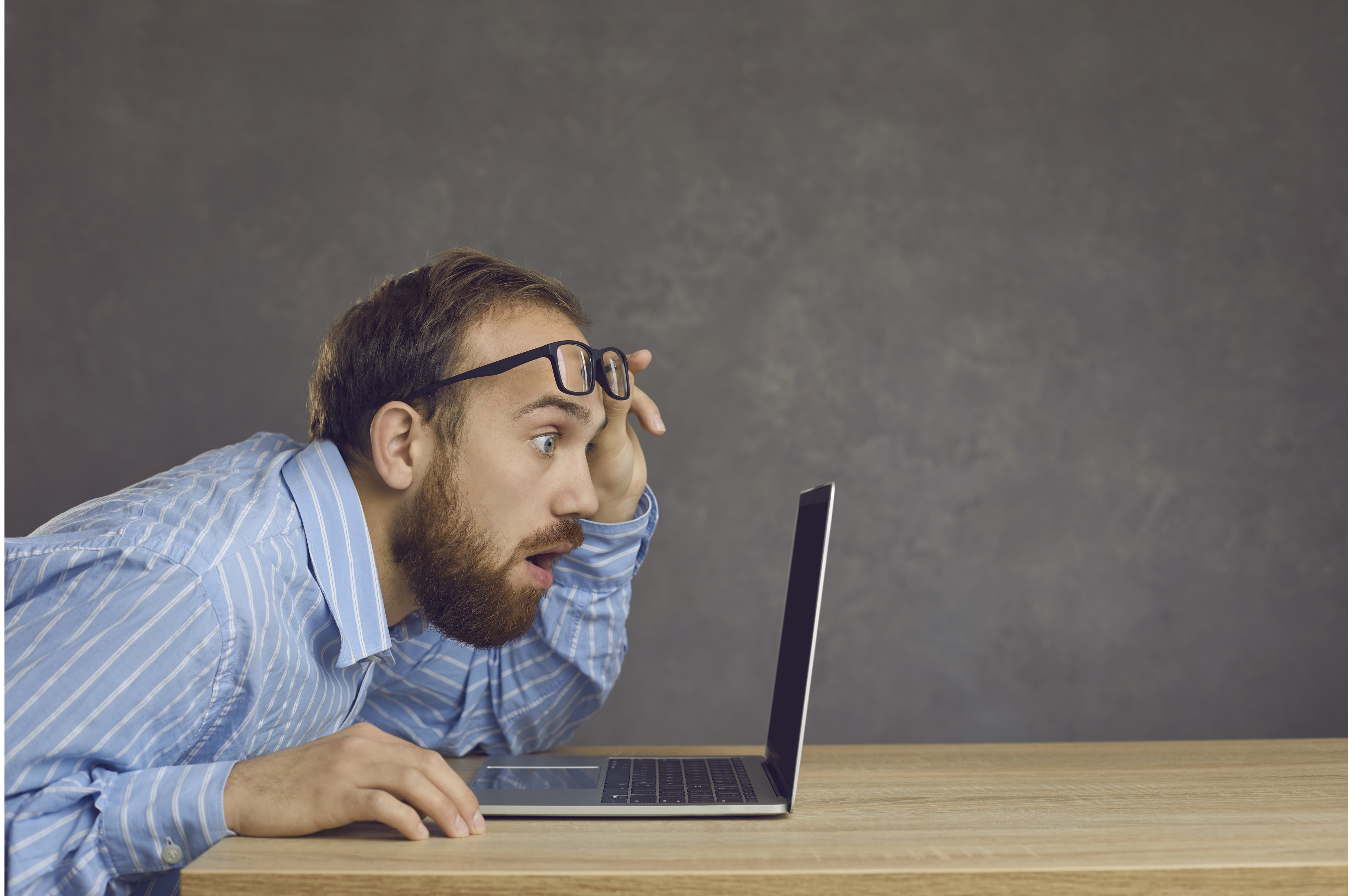 Side view of a man with a surprised, a Person Photo by StudioRomantic