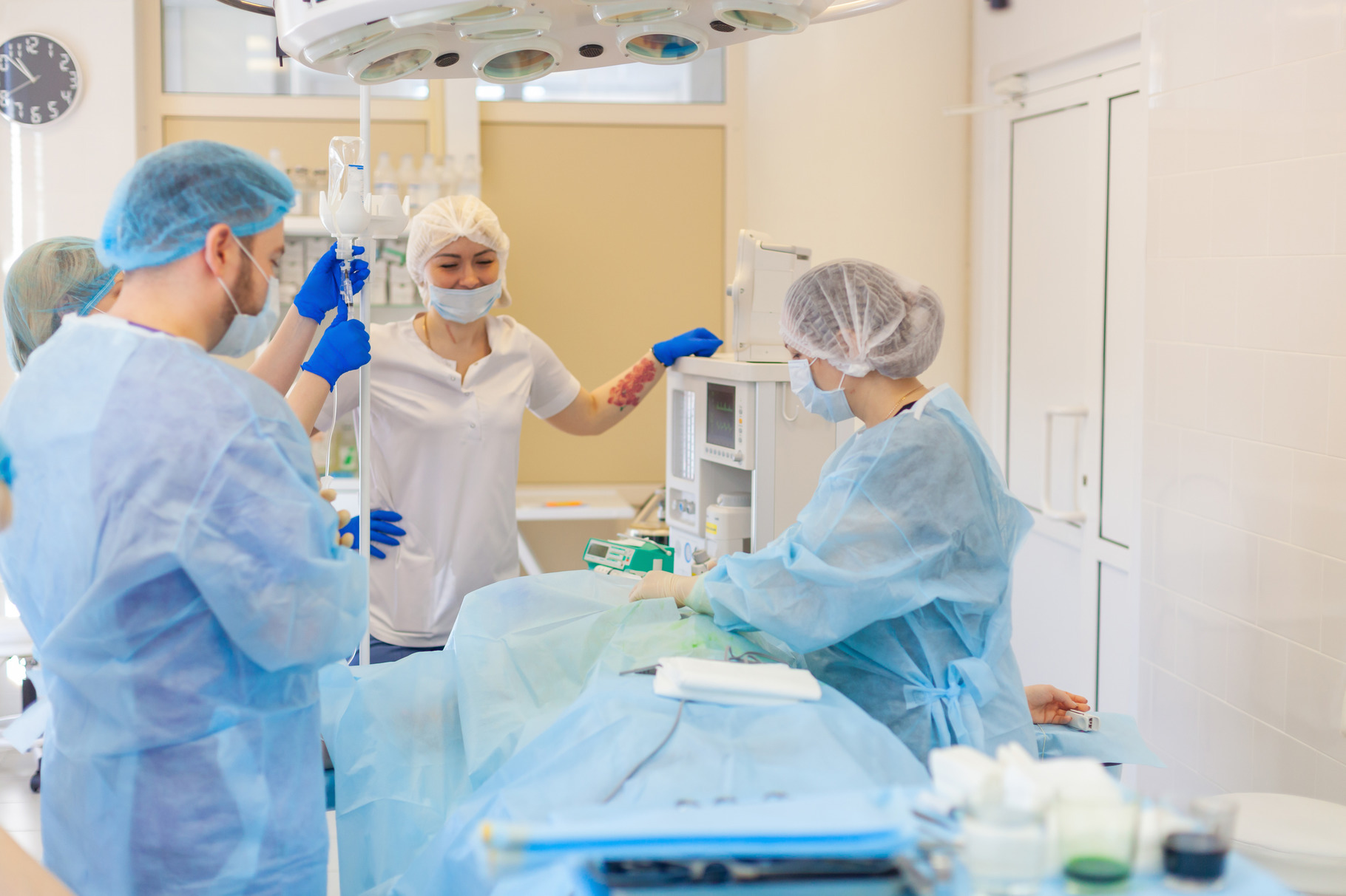 Hospital surgeon operates in the containing surgeon, doctor, and ...