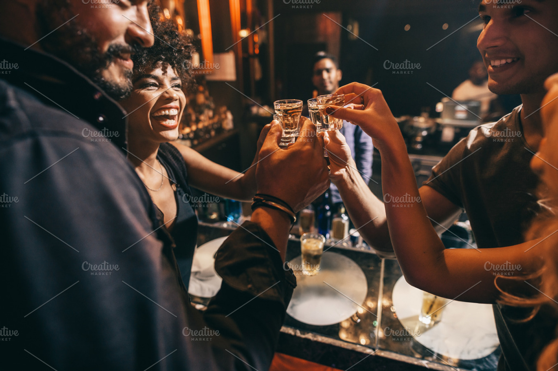 Friends toasting each other, a Person Photo by Jacob Lund | Creative Market