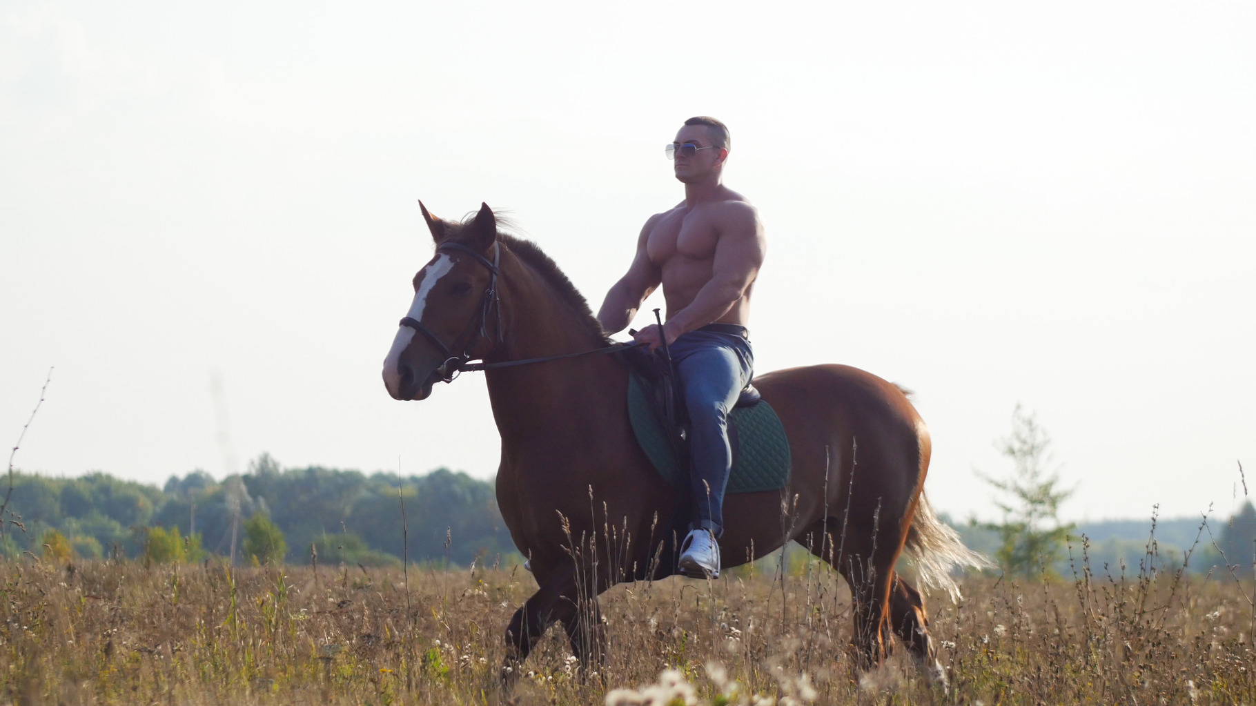 Attractive male bodybuilder riding a, a Photo by Barcelona_dreams