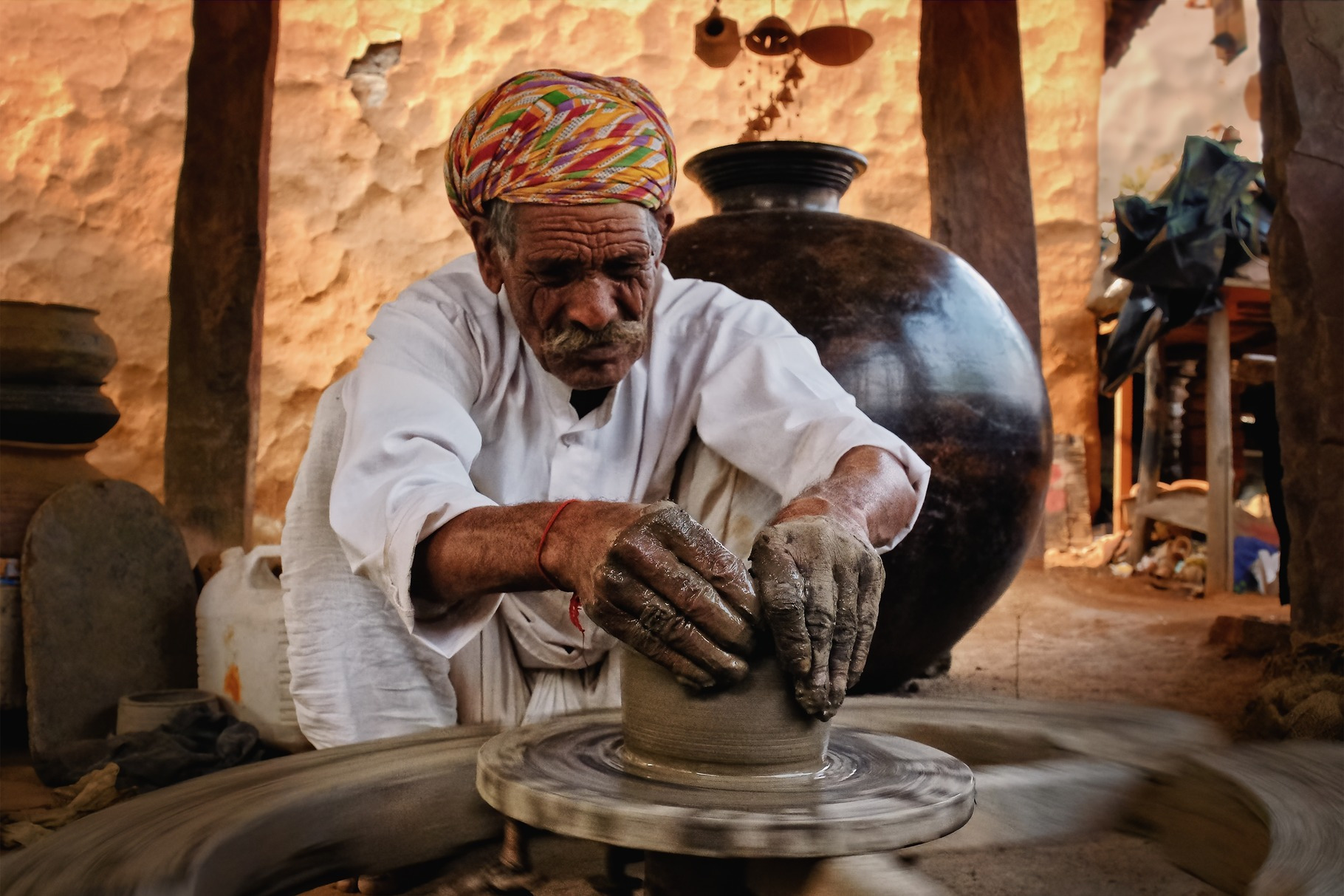 Indian potter at work handwork featuring potter, pottery, and india, a ...