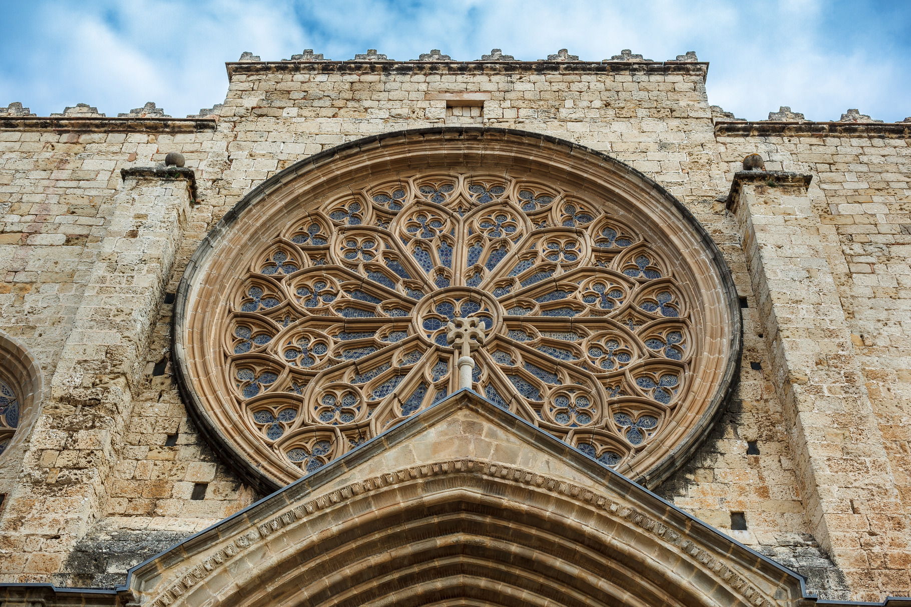 Rose window facade of the monastery featuring rose, windows, and facade ...
